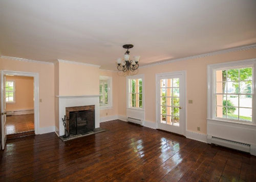 Beautifully updated 1840’s Side Hall Colonial overlooking sparkling one ...